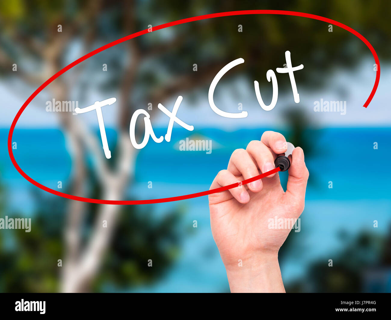Tax cut man writing on hi-res stock photography and images - Alamy