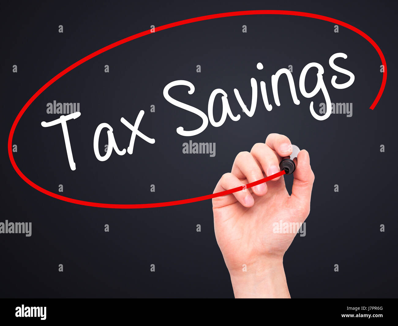 Man Hand writing Tax Savings with black marker on visual screen ...