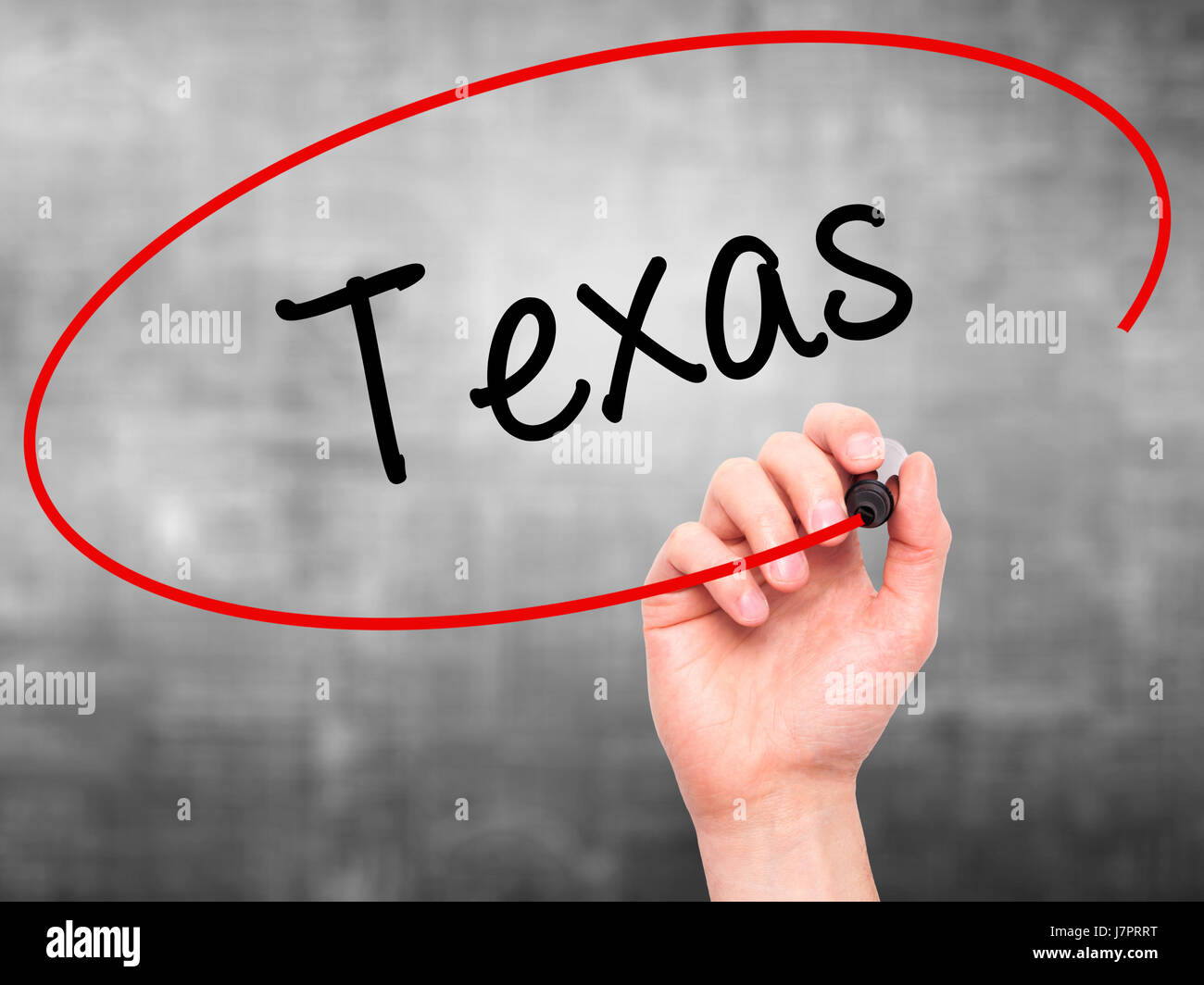Man Hand writing Texas with black marker on visual screen. Isolated on ...