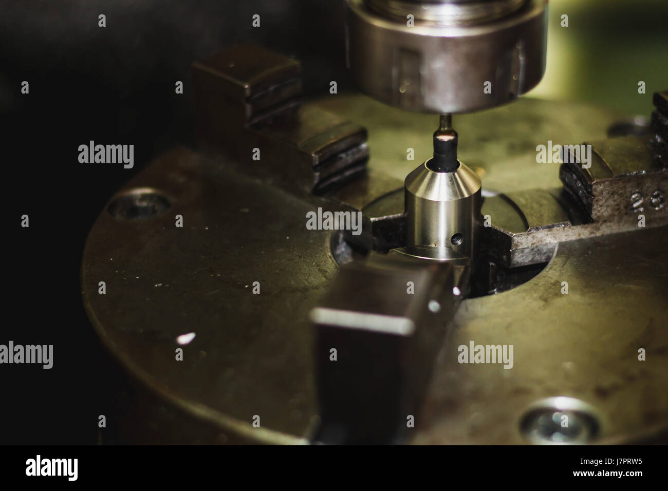 active milling machine during processing part of engine industry ...