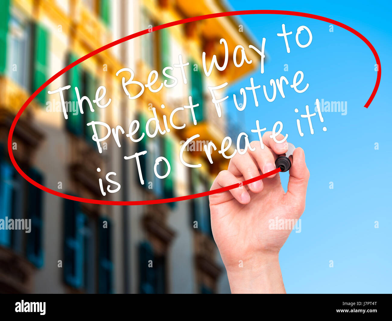 Man Hand writing The Best Way to Predict Future is To Create it! with ...