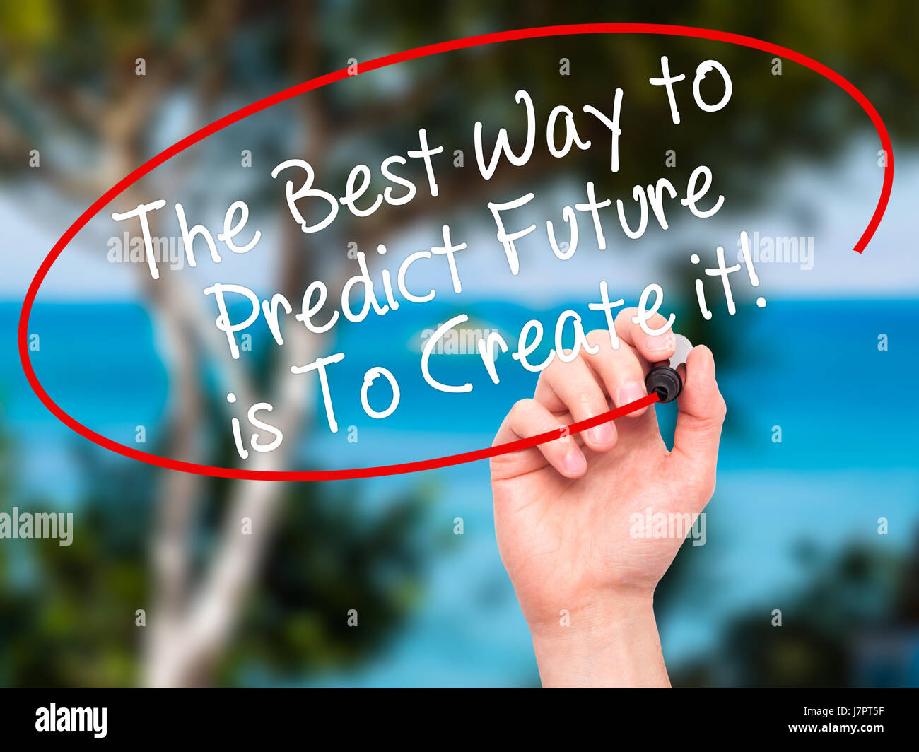 Man Hand writing The Best Way to Predict Future is To Create it! with ...