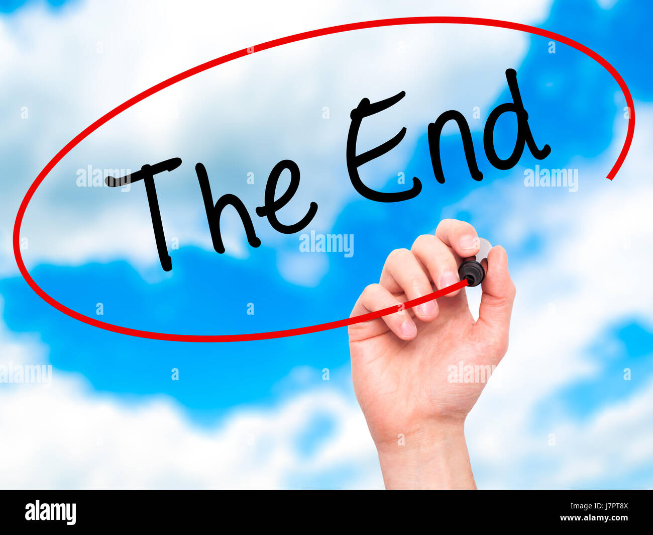 Man Hand writing The End with black marker on visual screen. Isolated ...