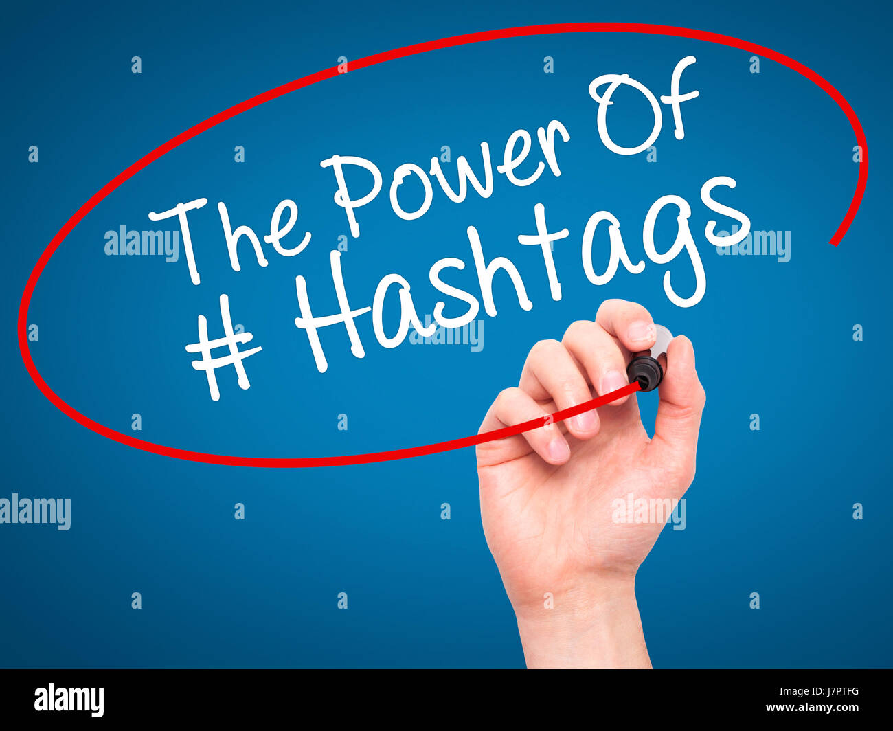 Man Hand writing The Power of Hashtags with black marker on visual ...