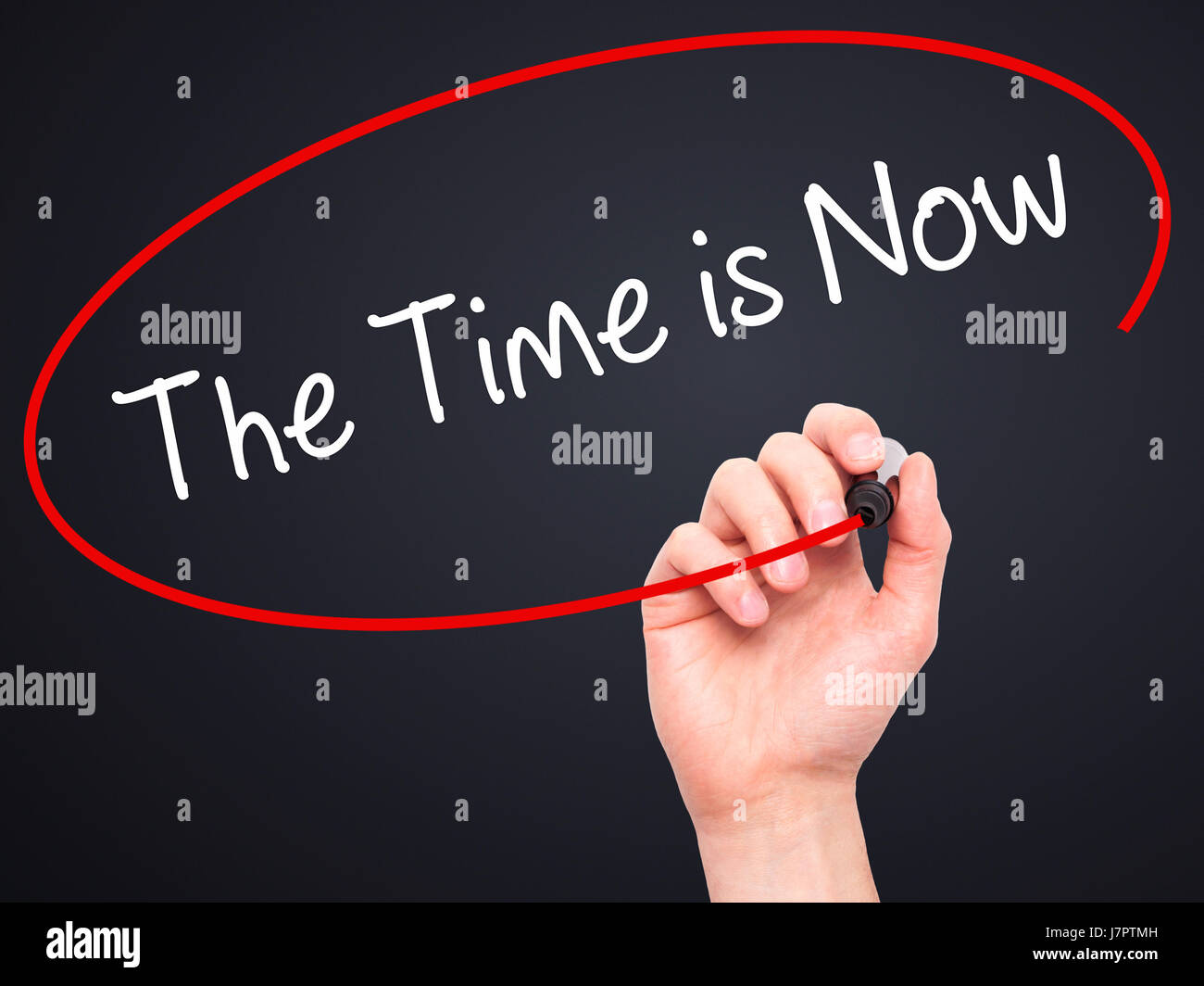 Man Hand writing The Time is Now with black marker on visual screen ...