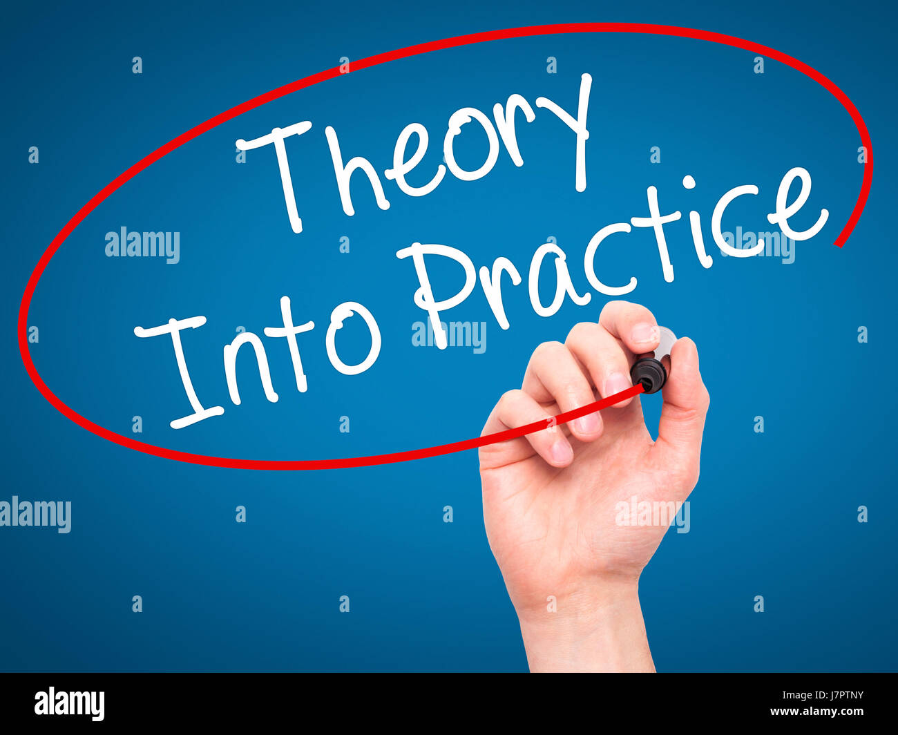 Man Hand writing Theory Into Practice with black marker on visual ...