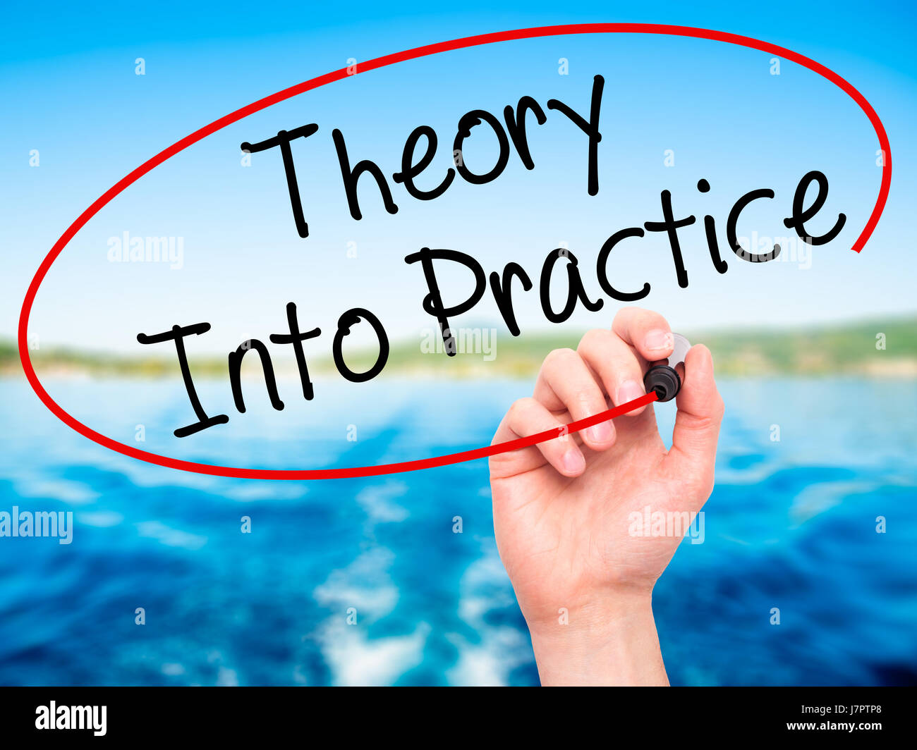 Man Hand writing Theory Into Practice with black marker on visual ...