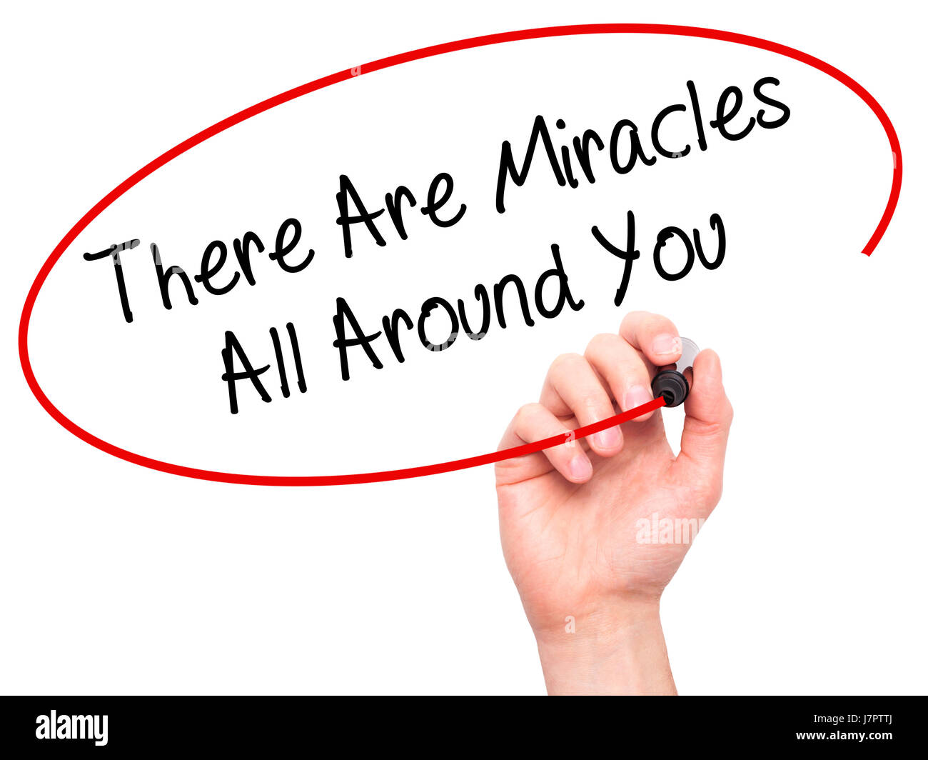 Man Hand writing There Are Miracles All Around You with black marker on ...