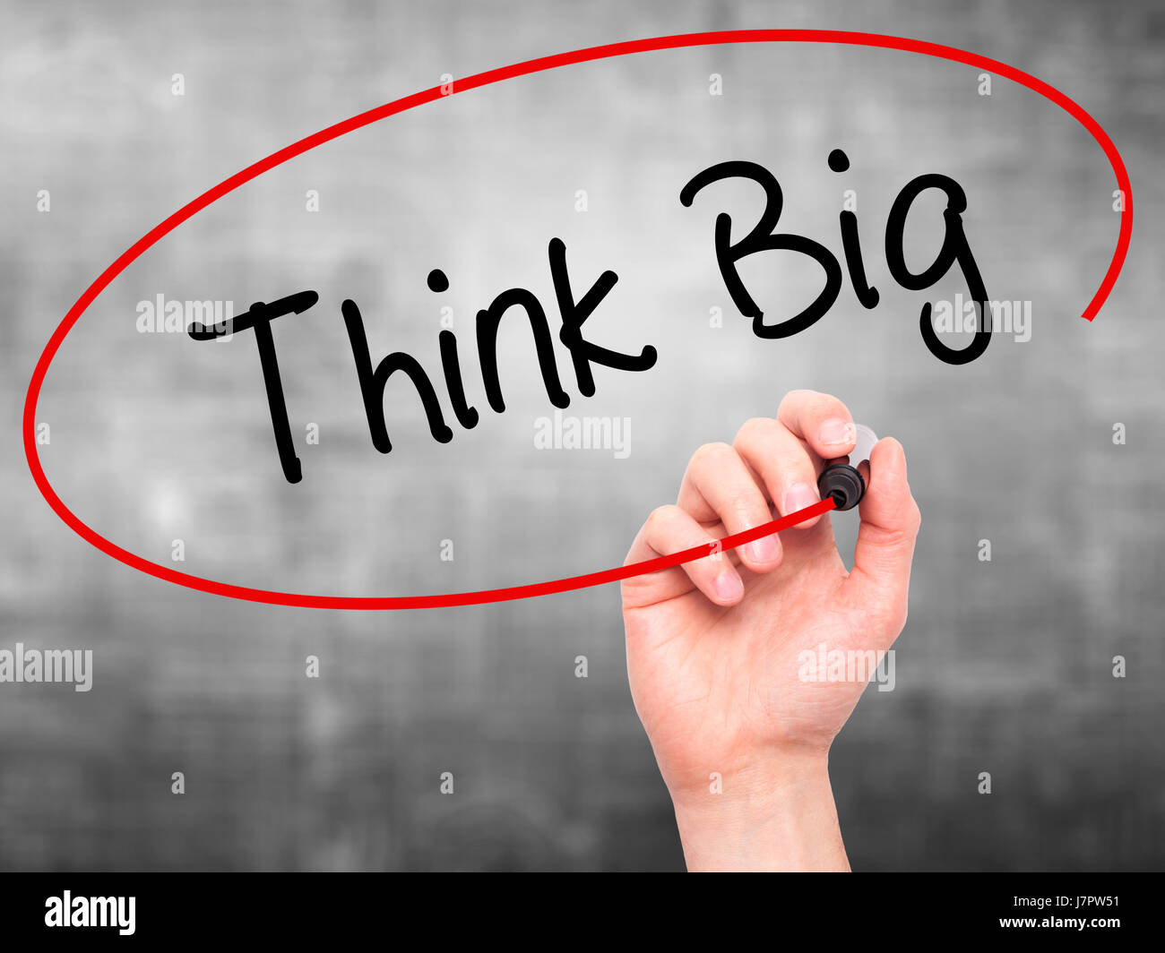Man Hand writing Think Big with black marker on visual screen. Isolated ...