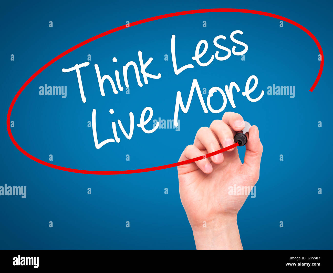 Man Hand writing Think Less Live More with black marker on visual ...