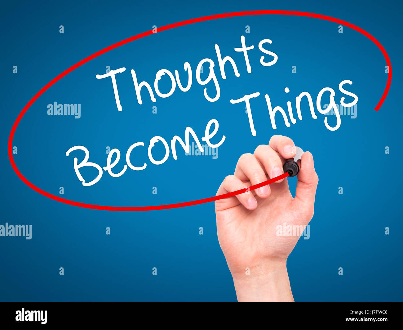 Man Hand writing Thoughts Become Things with black marker on visual ...