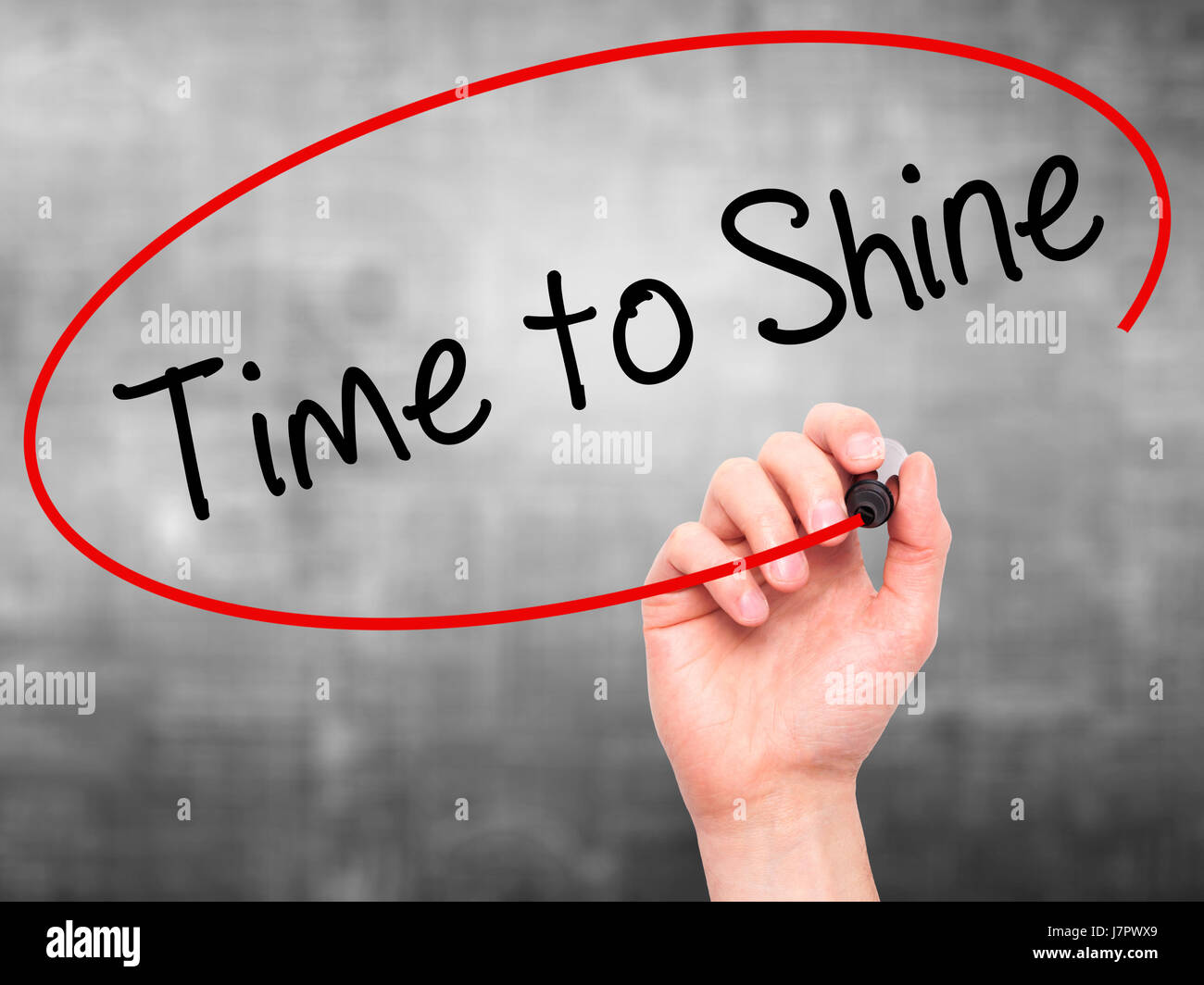 Man Hand writing Time to Shine with black marker on visual screen ...