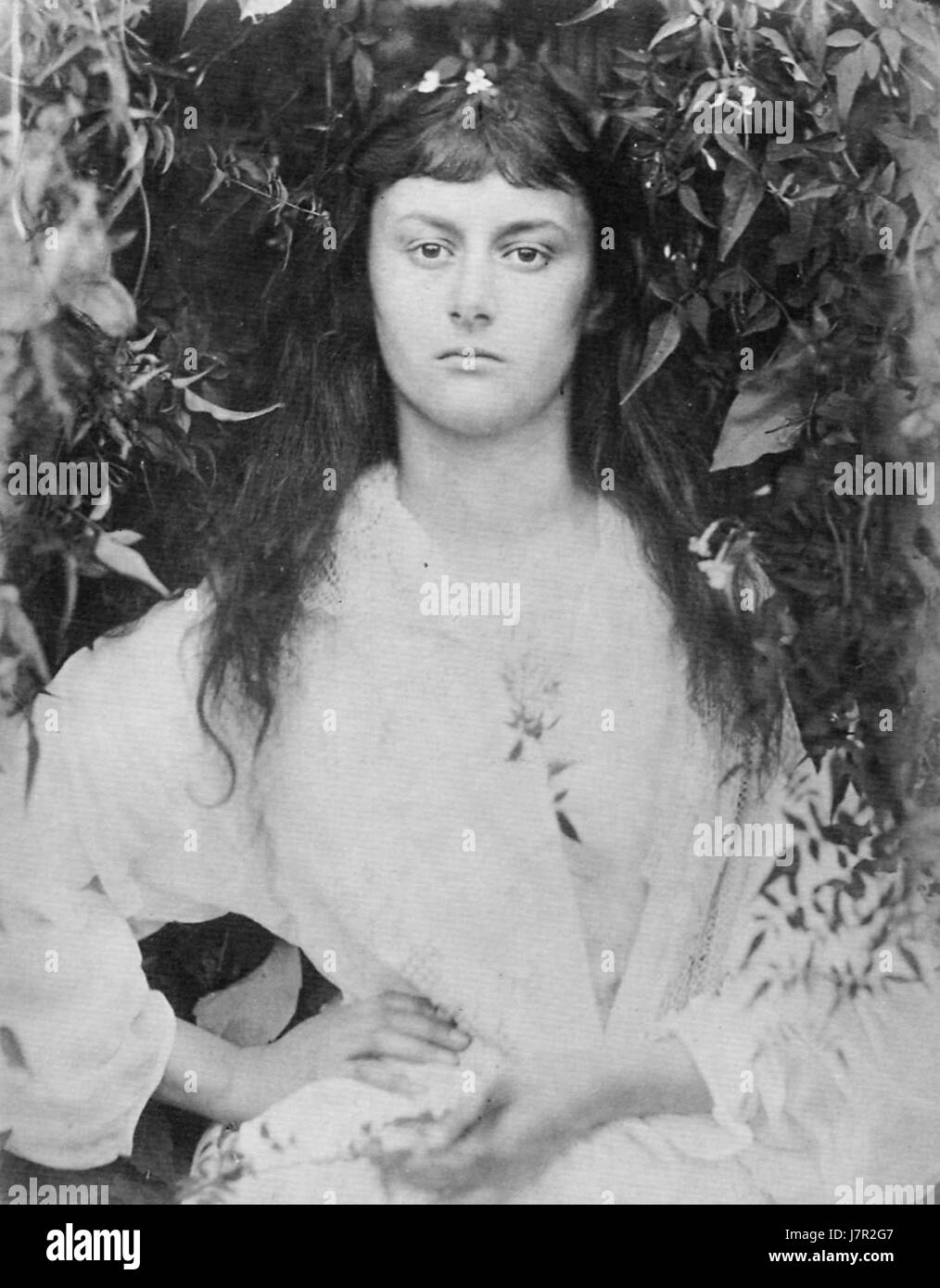 The image depicts Alice Liddell in 1872, photographed by Julia Margaret ...