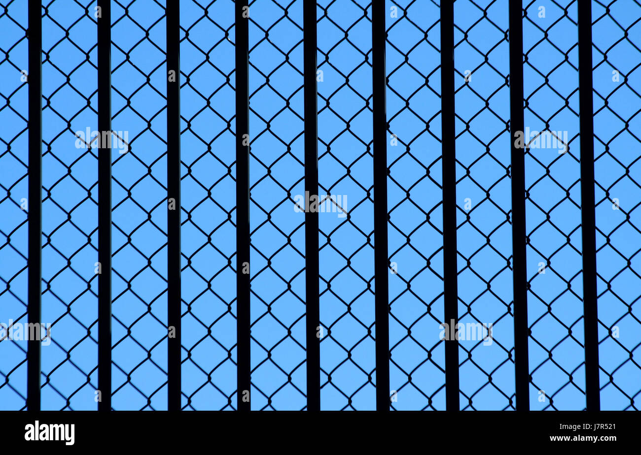 blue metal barrier wire fence fence in fencing pattern firmament sky ...