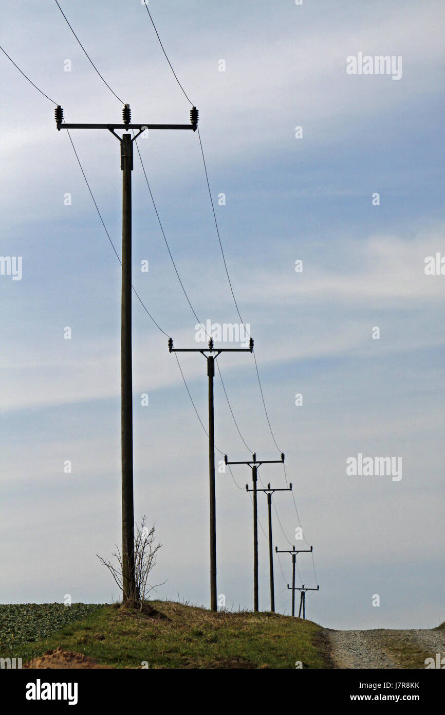 old power line on a dirt road Stock Photo - Alamy
