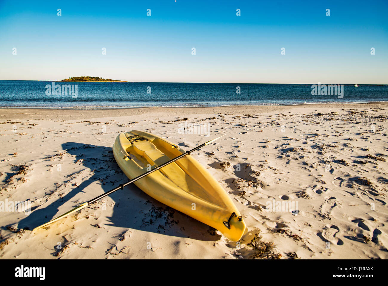 An old yellow canoe Stock Photo - Alamy