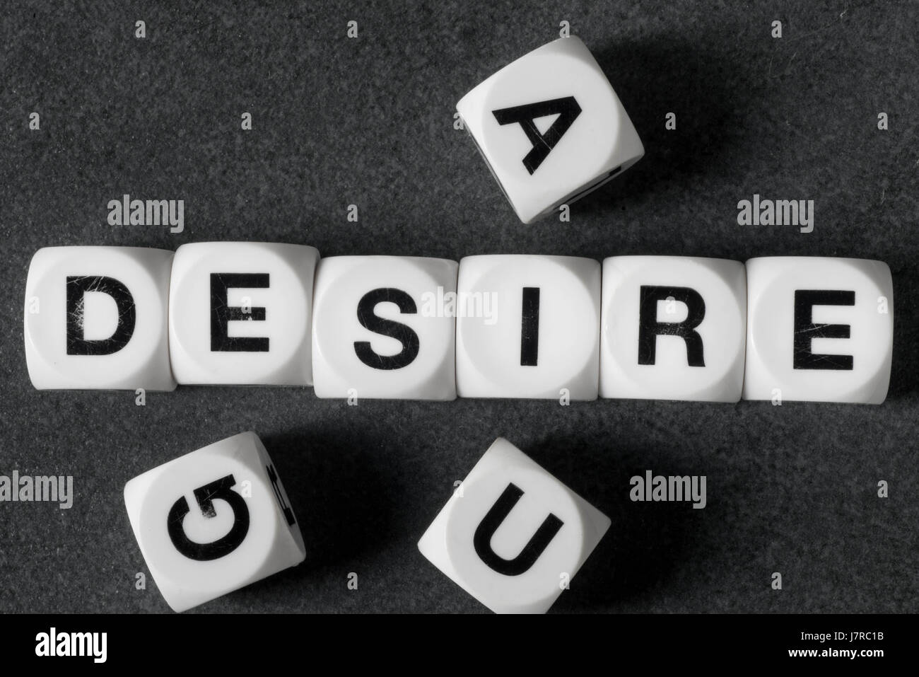 word desire on white toy cubes Stock Photo - Alamy