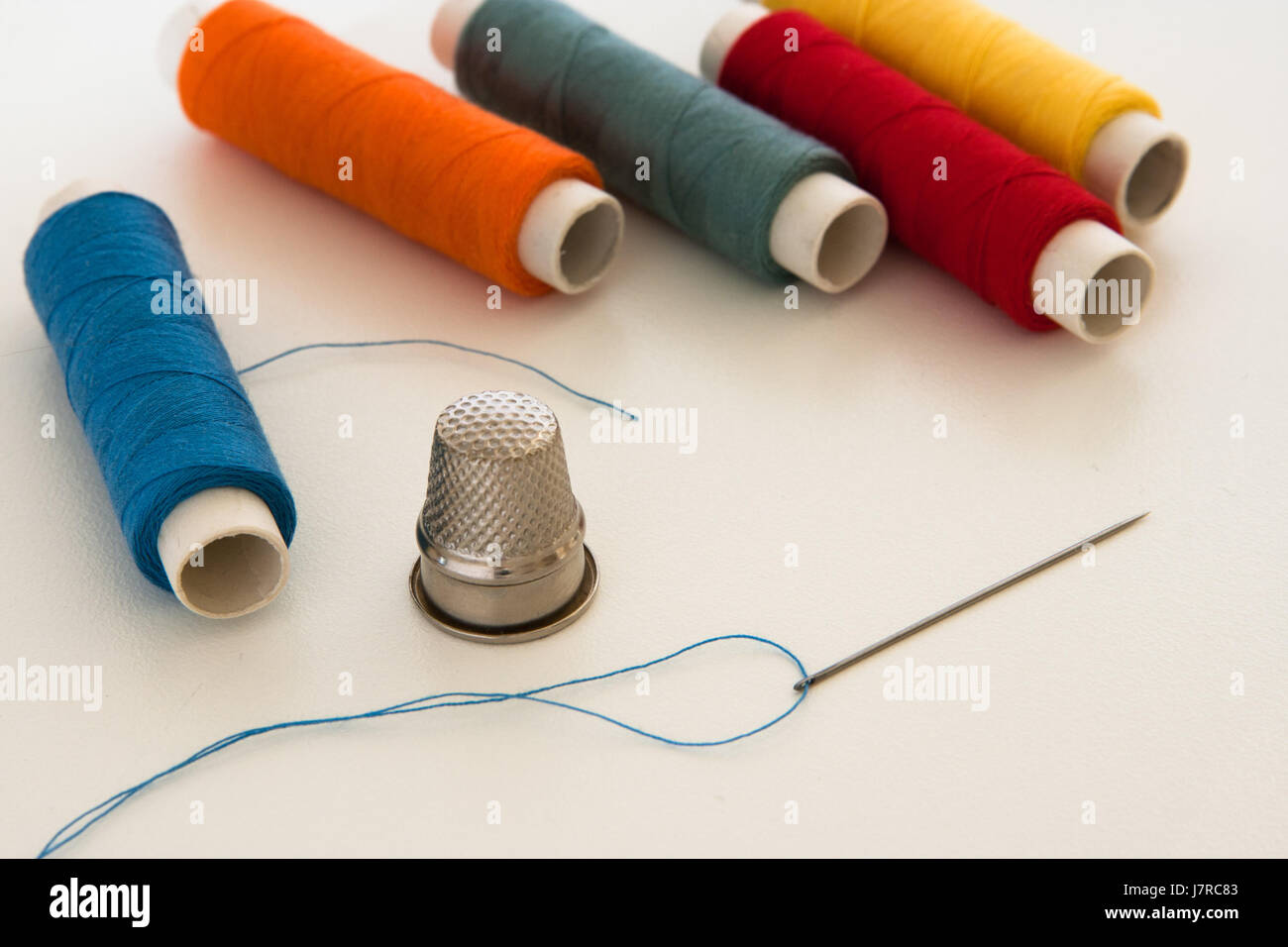 needle and thread Stock Photo - Alamy