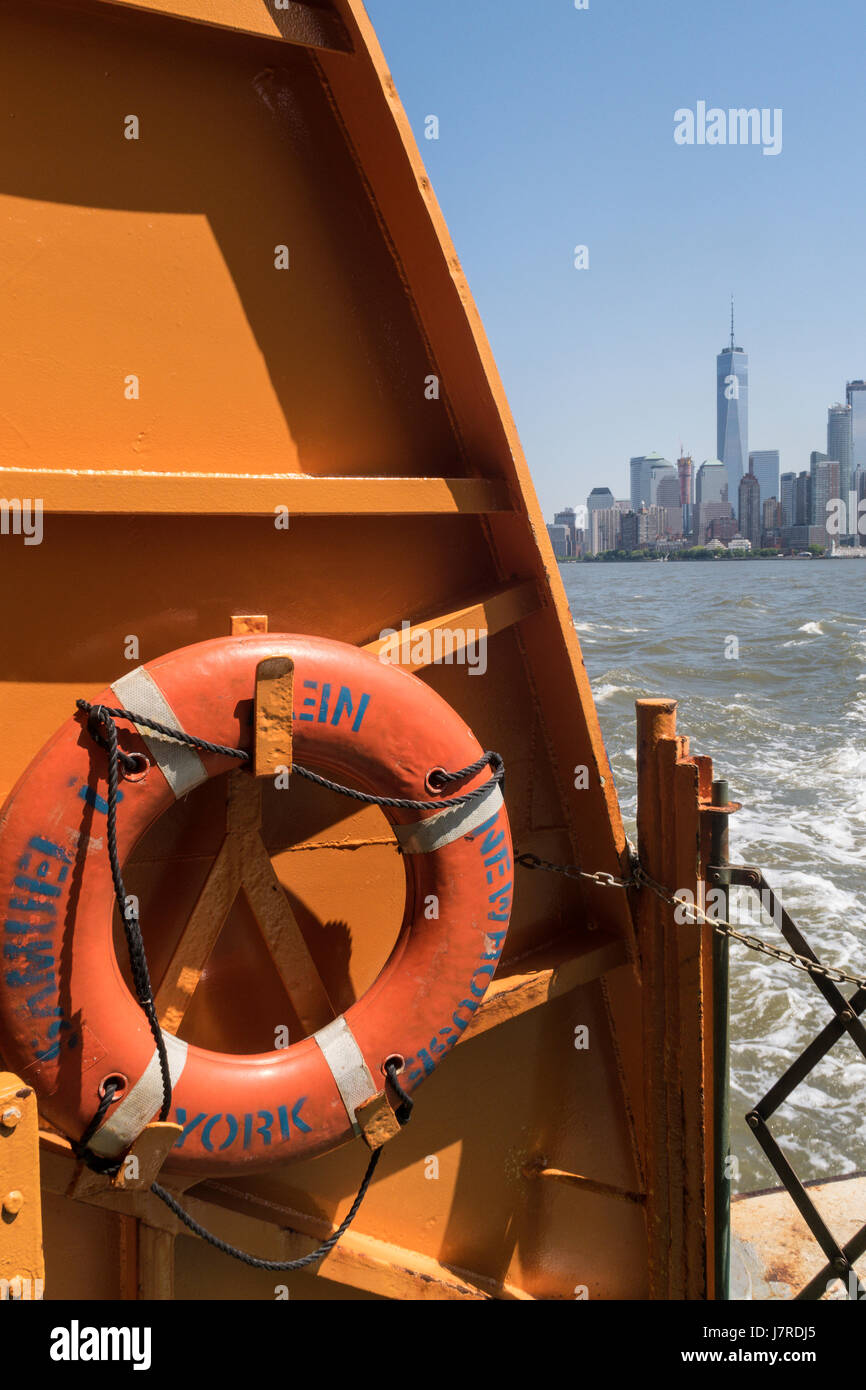 Staten Island Ferry Bulkhead with Life Preserver and Manhattan Skyline ...