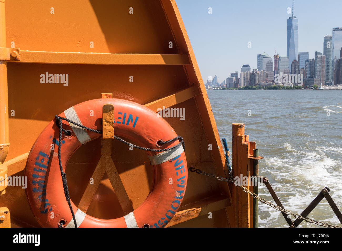 Staten Island Ferry Bulkhead with Life Preserver and Manhattan Skyline ...