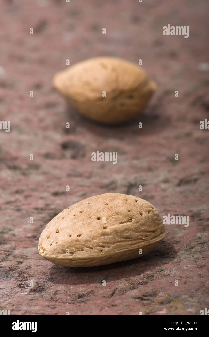 almonds on stone Stock Photo - Alamy