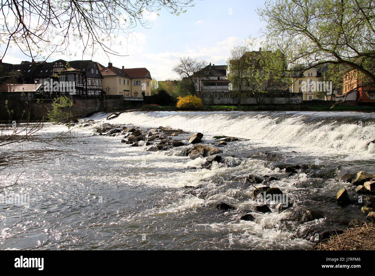 waterfall rapids bank river water shore tree trees flow fluent stone ...