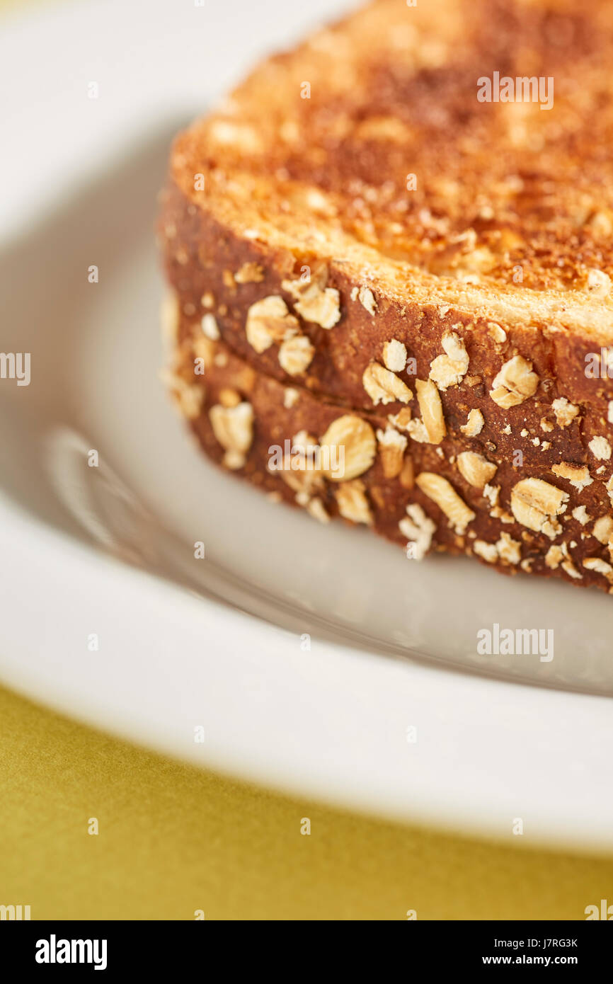 two slices of whole grain toast Stock Photo - Alamy