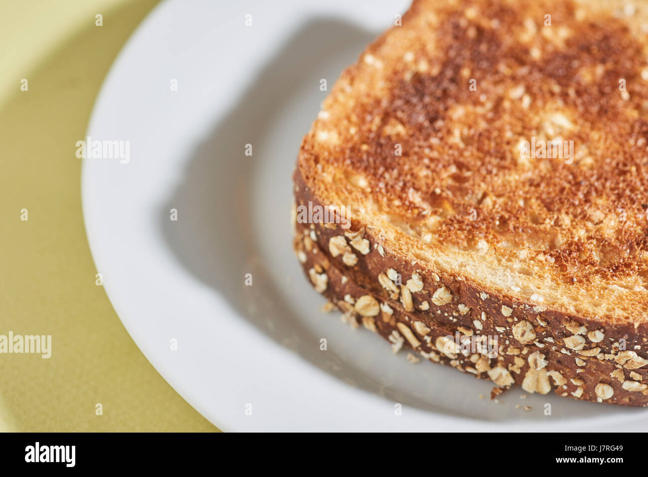 two slices of whole grain toast Stock Photo - Alamy