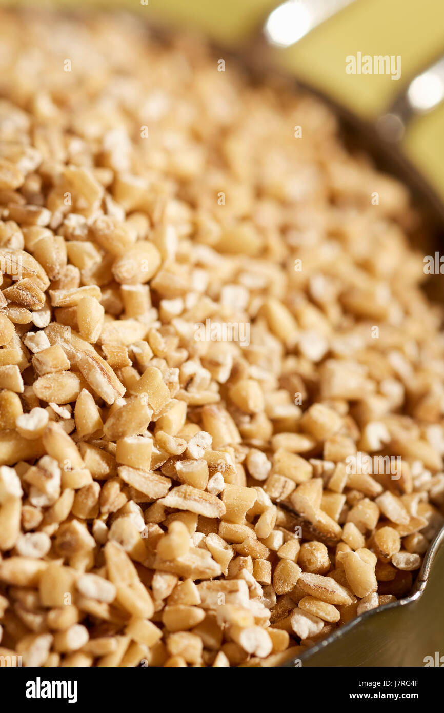 uncooked pinhead oats, also called steel cut oats Stock Photo - Alamy