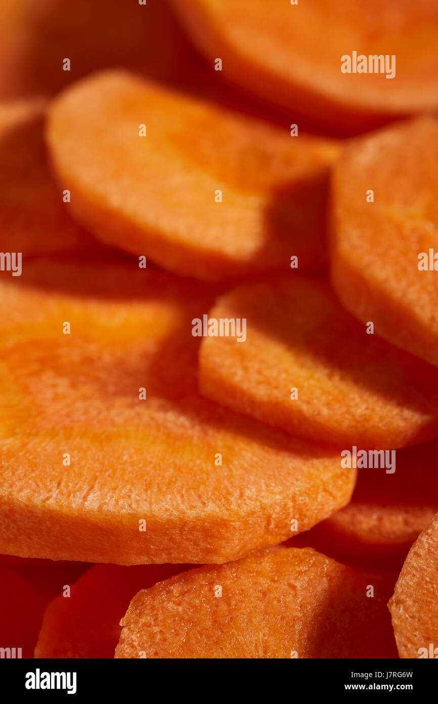 sliced raw carrots, sometimes called carrot coins Stock Photo - Alamy