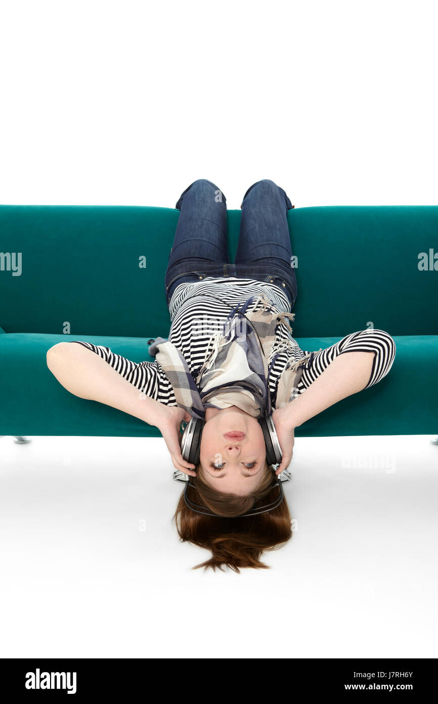 woman listening music upside down Stock Photo - Alamy