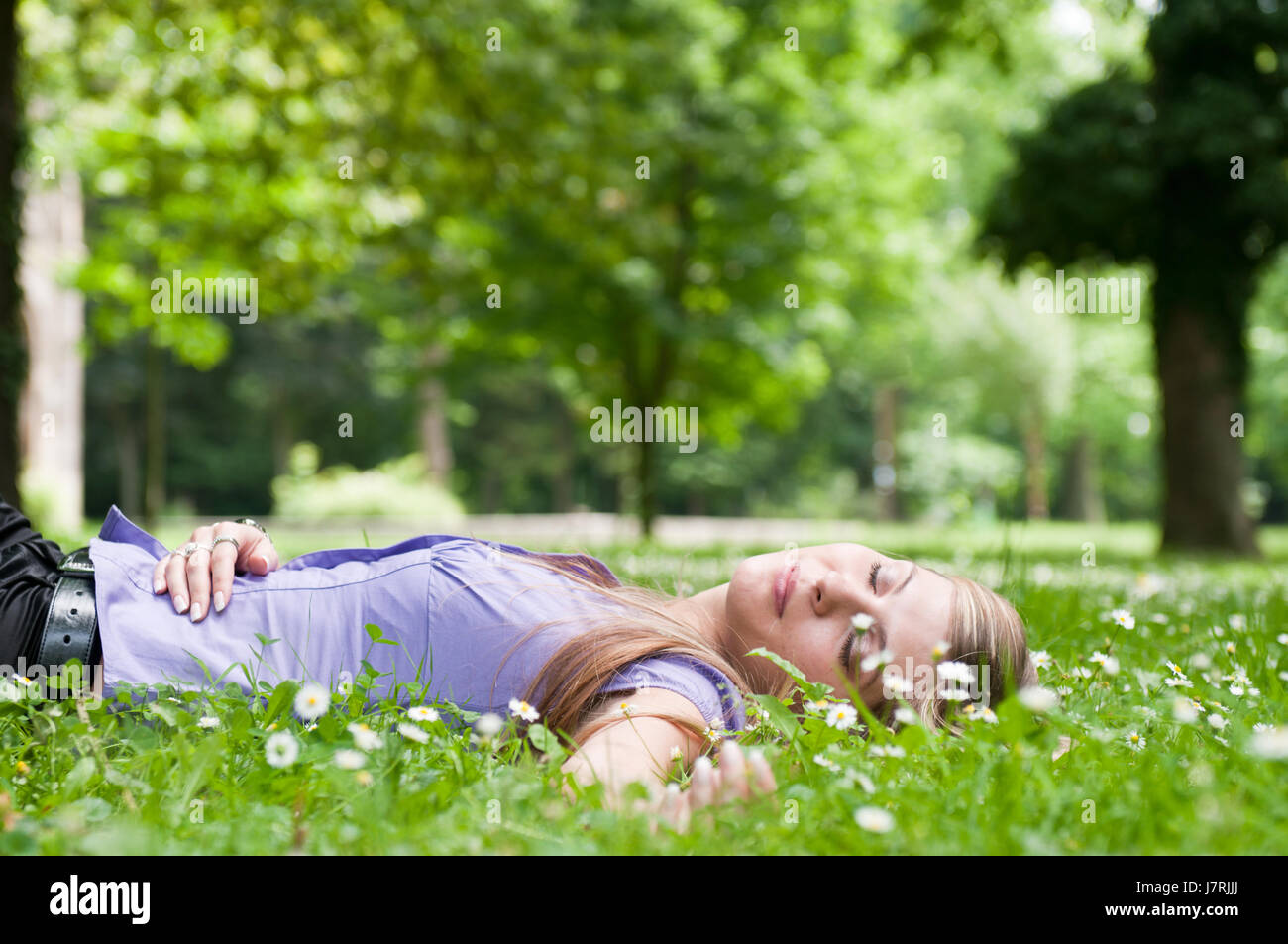 woman beautiful beauteously nice face person lie lying lies delighted ...