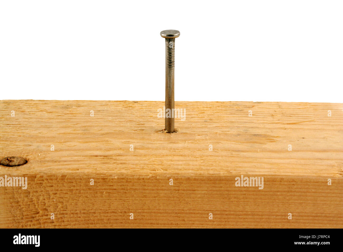 tool isolated closeup wood nail plank working nails wood grain ...