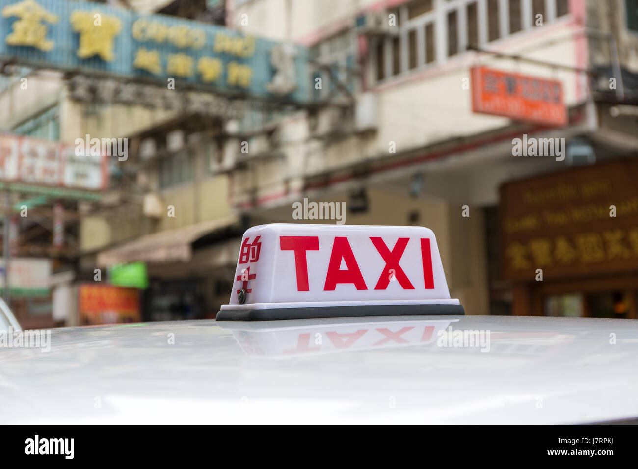 Taxi sign in Hong Kong Stock Photo - Alamy