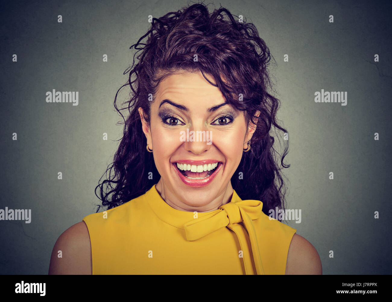 Portrait of a beautiful woman laughing looking at camera Stock Photo ...