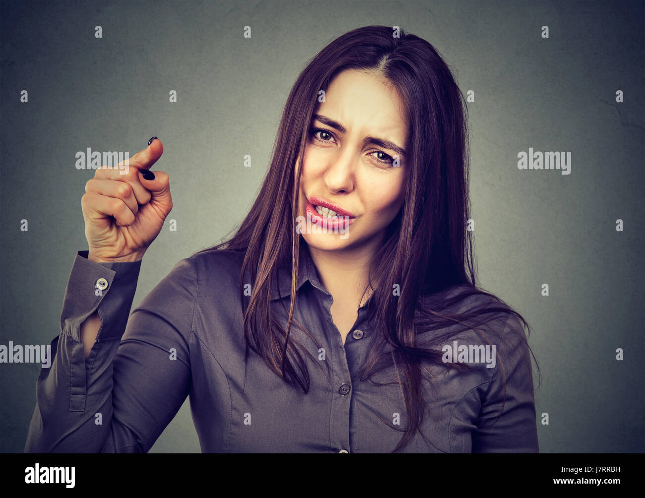 angry woman pointing her finger accusing someone Stock Photo - Alamy