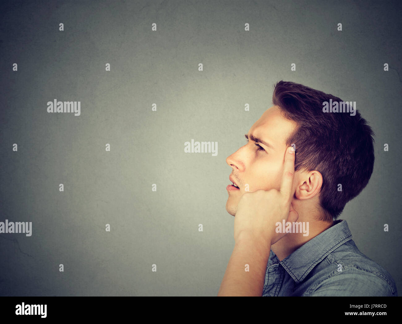 handsome business man thinking Stock Photo - Alamy