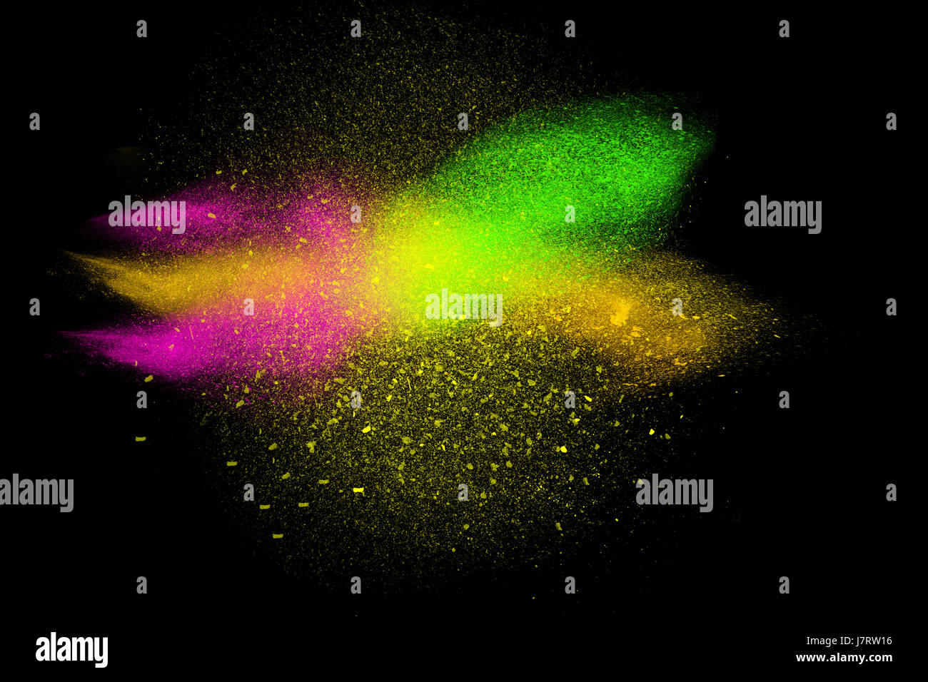 Freeze motion of colorful powder exploding isolated on black dark ...