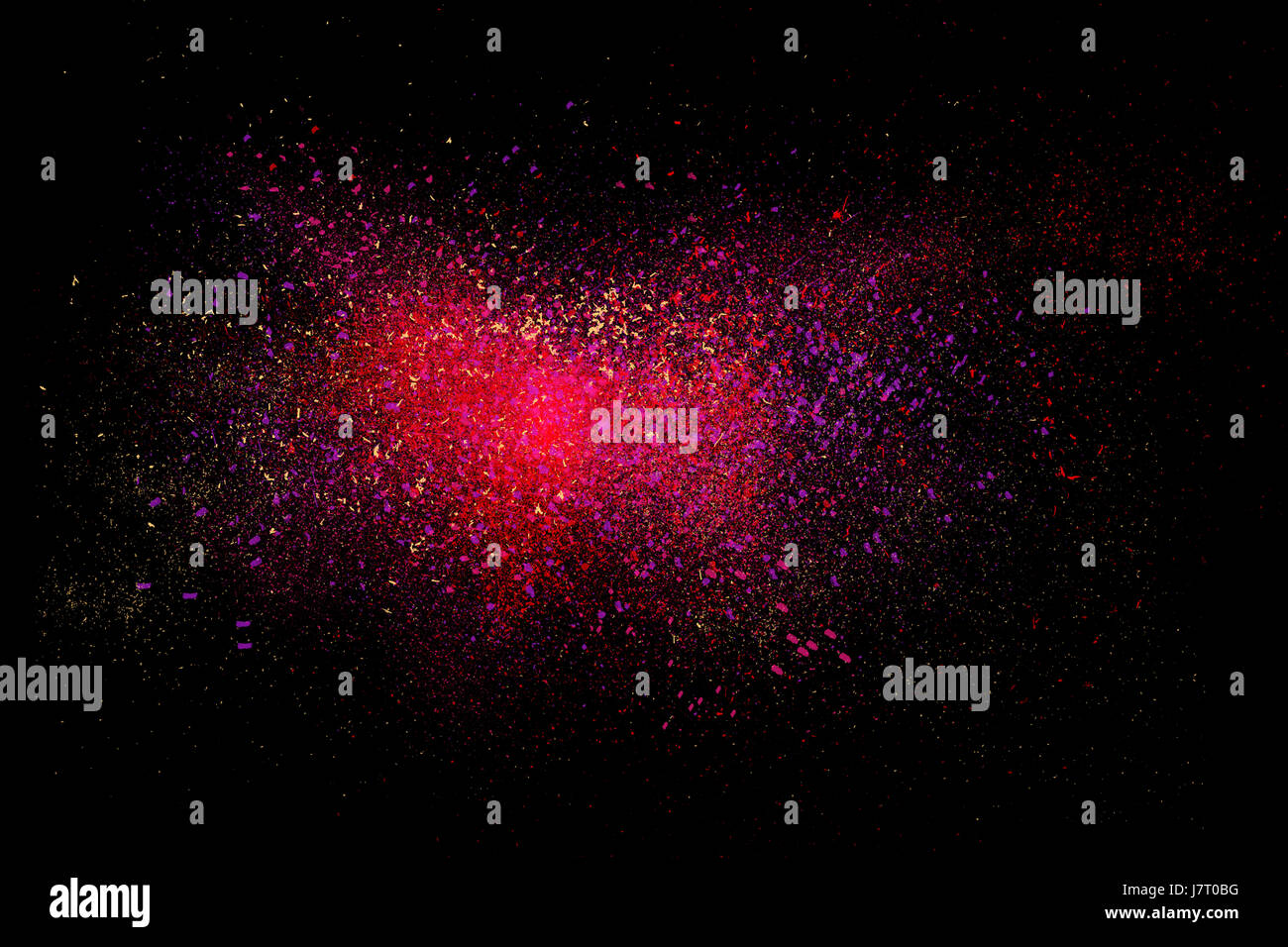 Freeze motion of red powder exploding, isolated on black, dark ...