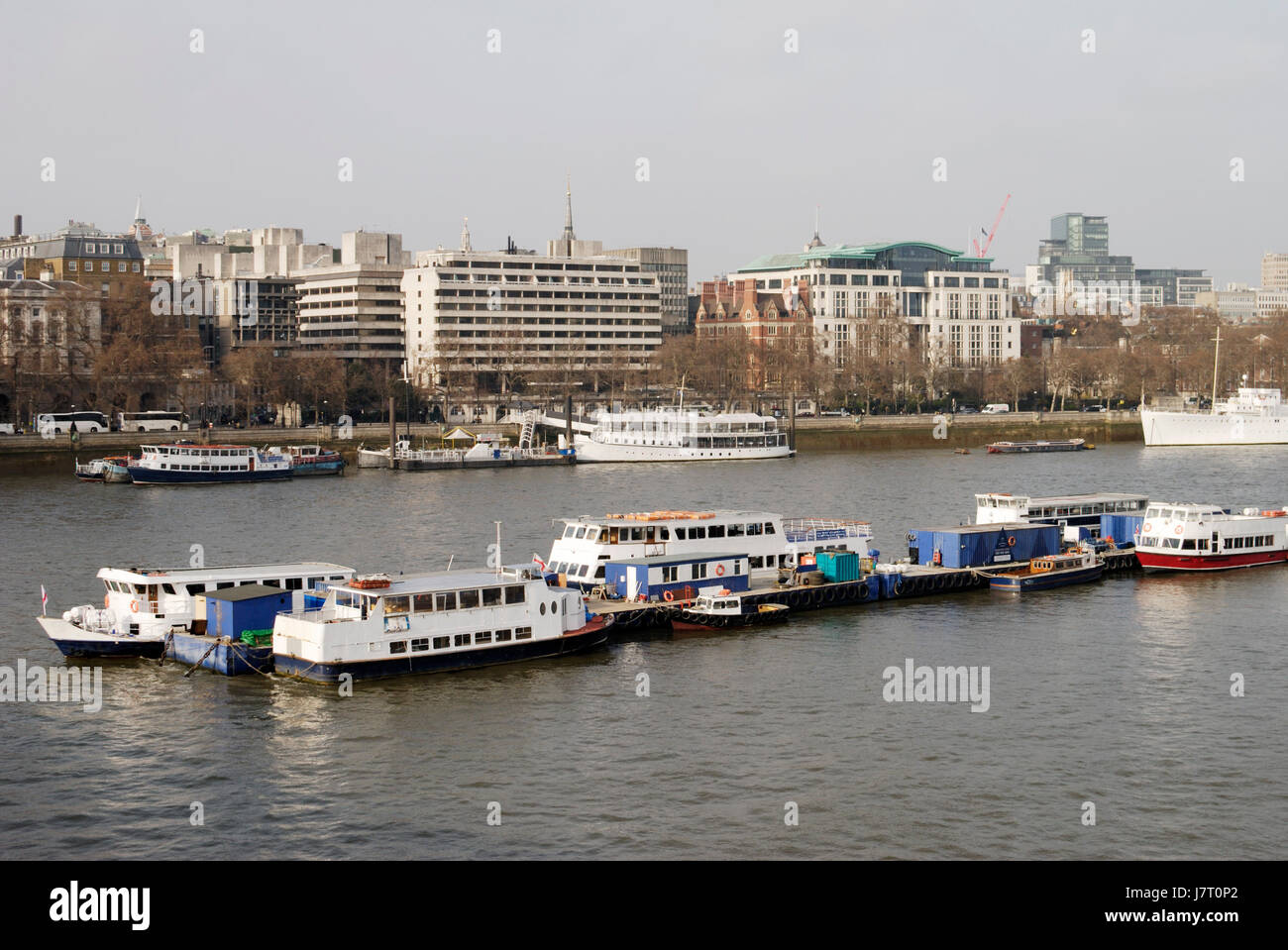 city town london england thames boat embankment dam river water rowing ...