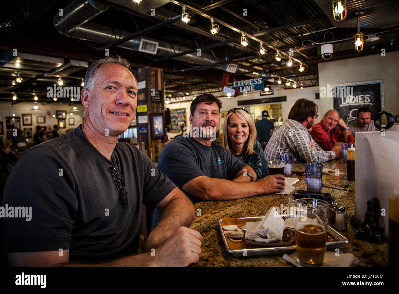 People having bbq lunch at Pecan Lodge, Deep Ellum, Dallas, Texas Stock ...