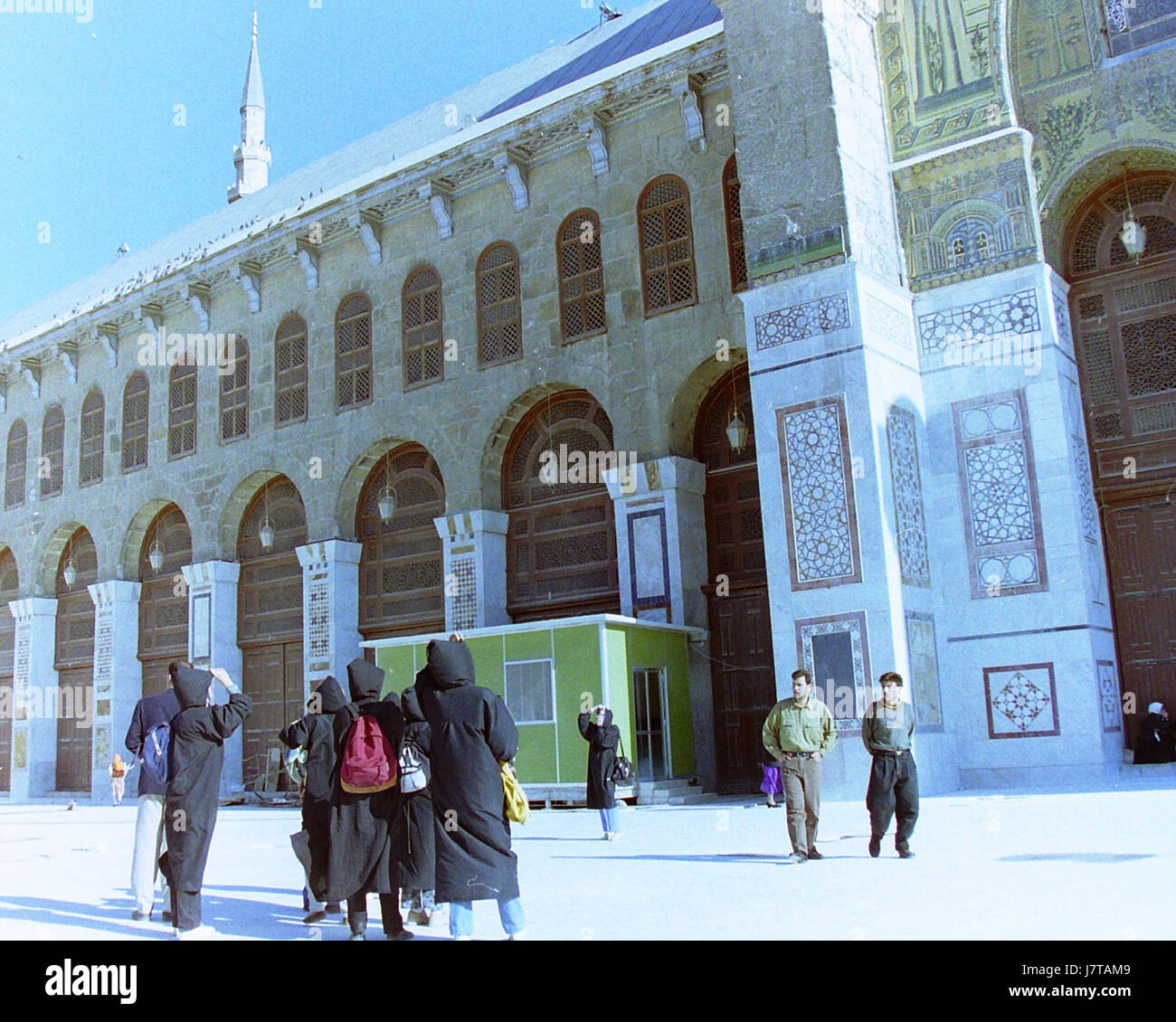 In 1993, female tourists visited the Umayyad Mosque in Damascus, Syria ...
