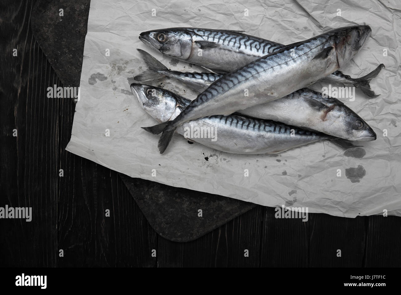Scomber fish in wrapping paper Stock Photo - Alamy