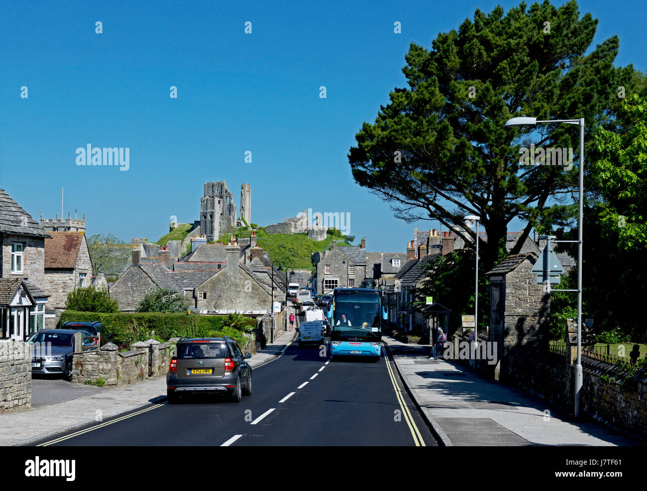 The A351 road through the village of Corfe Castle, Dorset, England UK ...