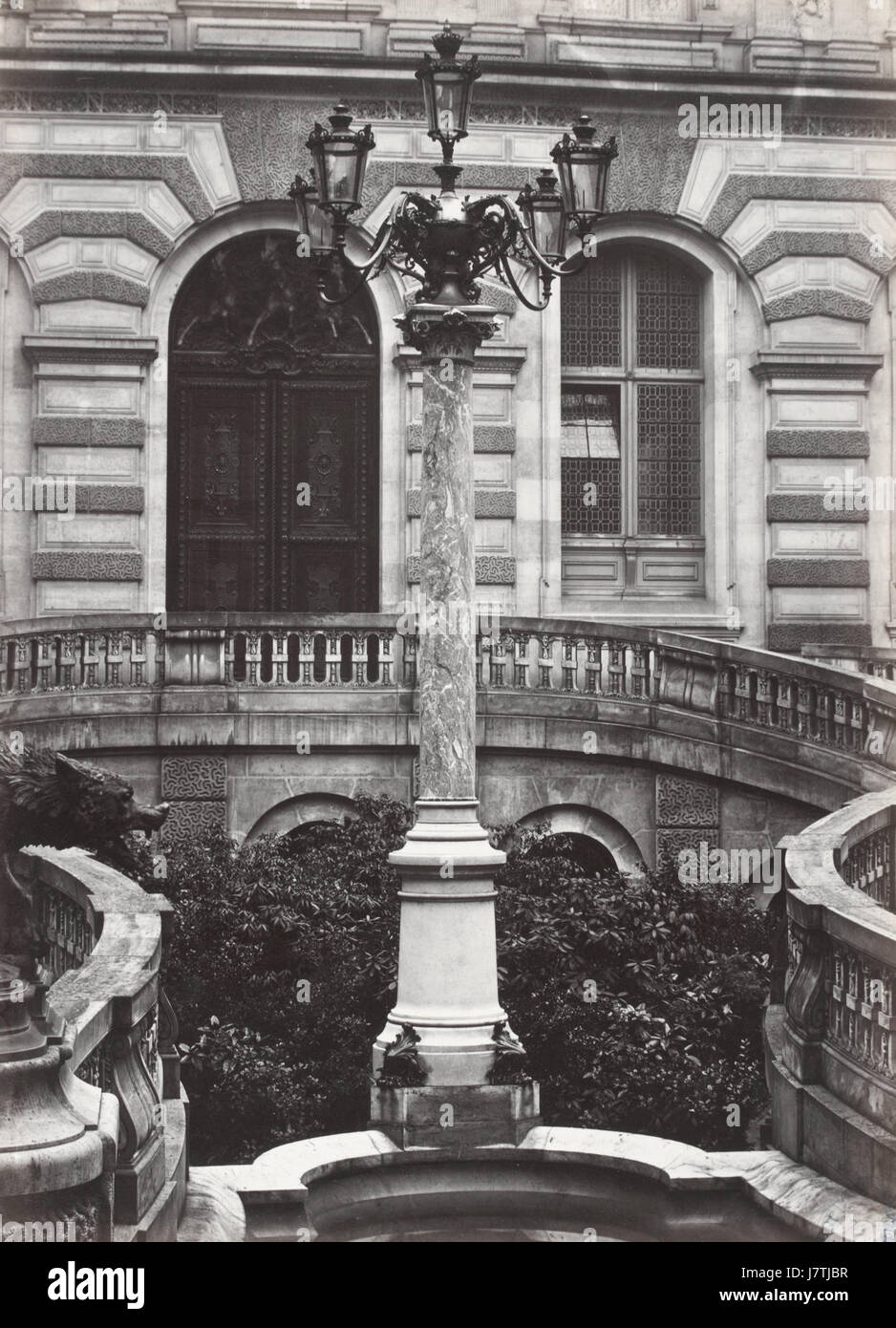 The photograph by Charles Marville, taken in 1878, depicts the Cour ...