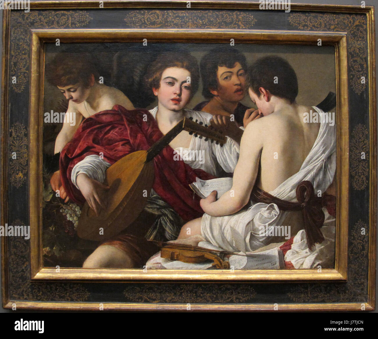 The painting 'Musici' by Caravaggio, created around 1595, portrays musicians in a realistic and ...