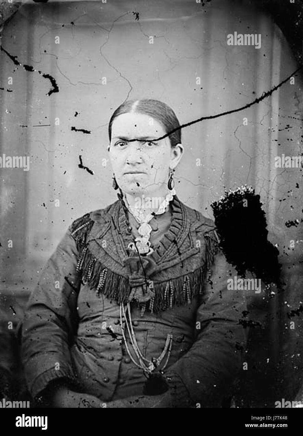 A woman depicted in the artwork 'NLW3364747' exemplifies themes of ...