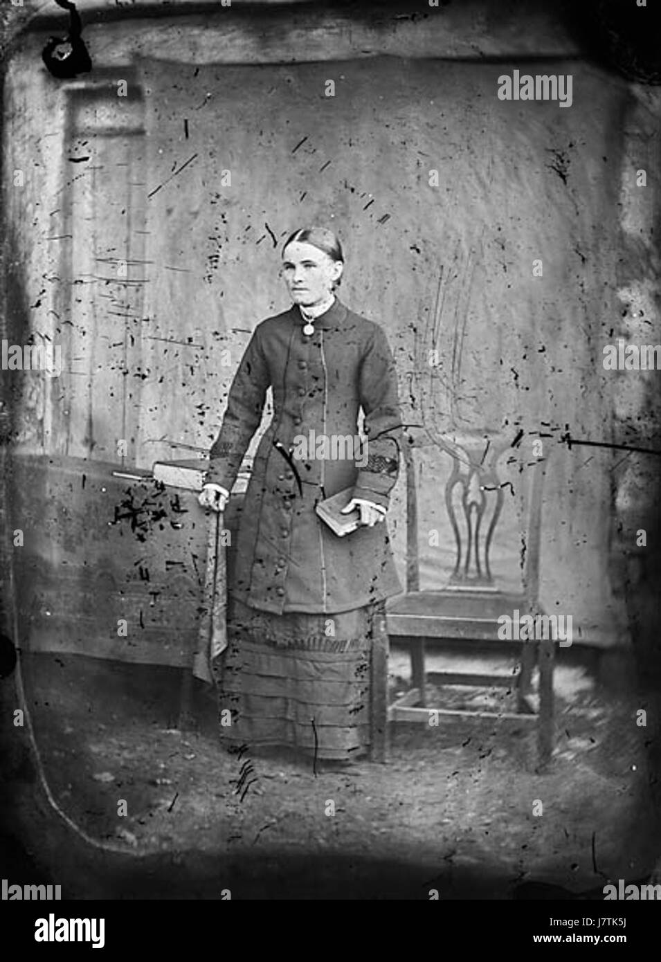 Woman figure holding Black and White Stock Photos & Images - Alamy