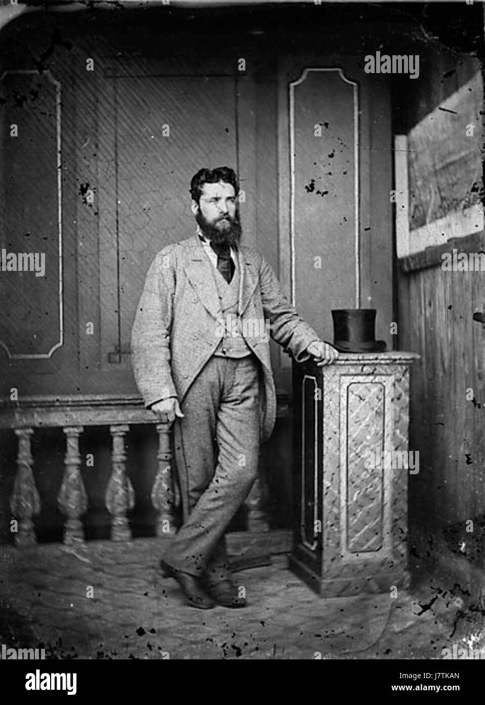 A man standing with registration number NLW33649 refers to a vehicle or item with this specific ...