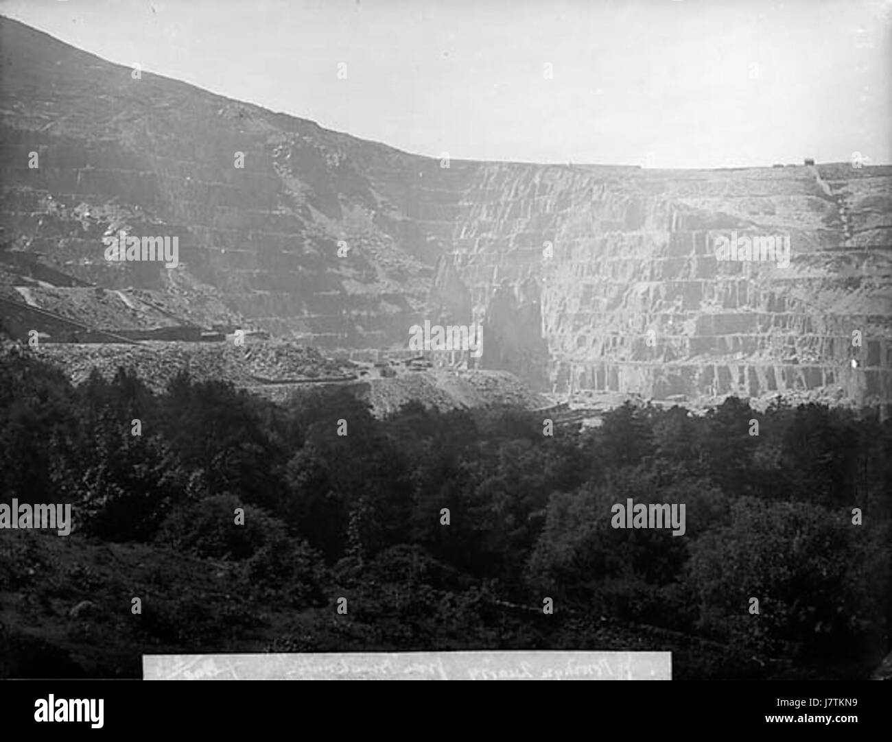 This photograph or artwork showcases the view of the Penrhyn Quarry ...
